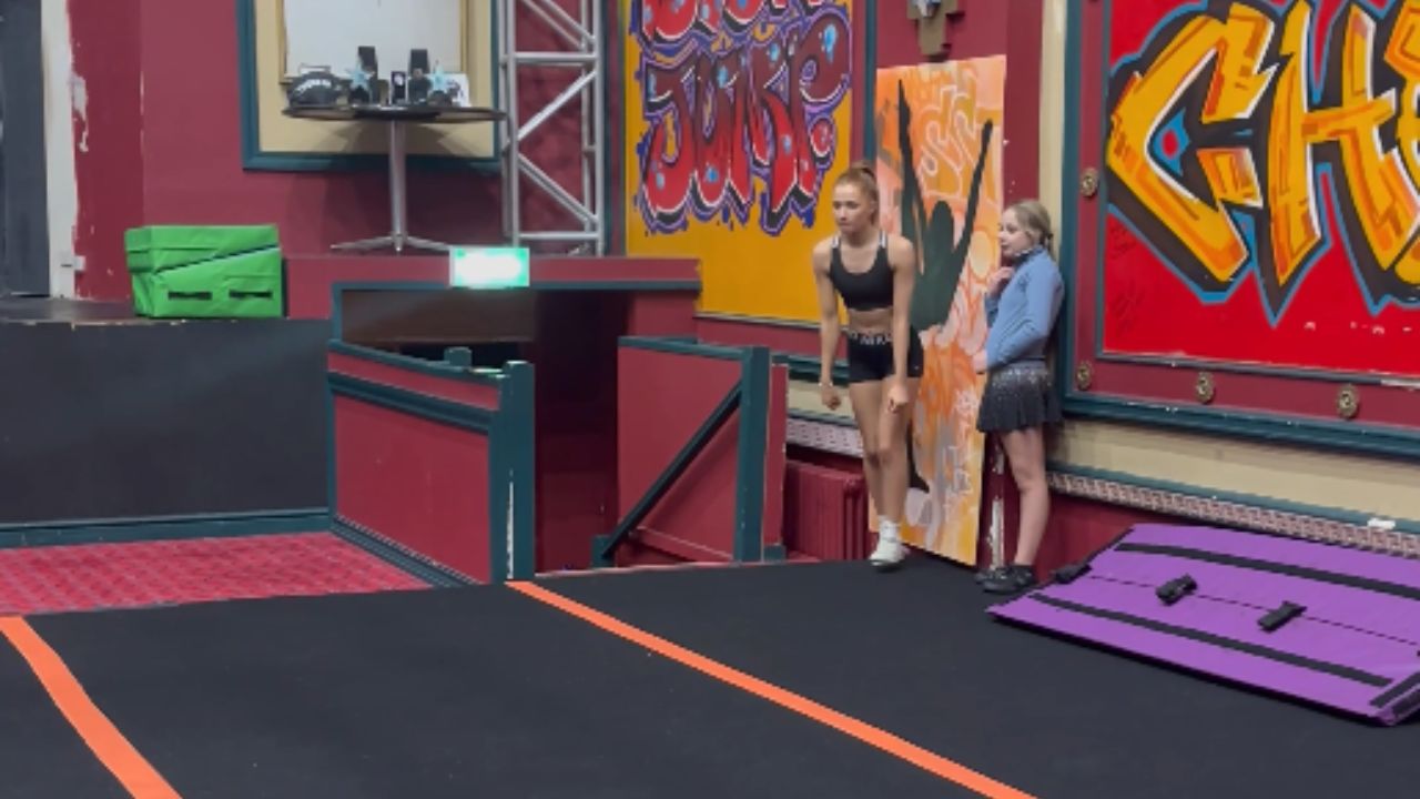 Cheerleader attempts an easy tumbling pass & gets instantly humbled