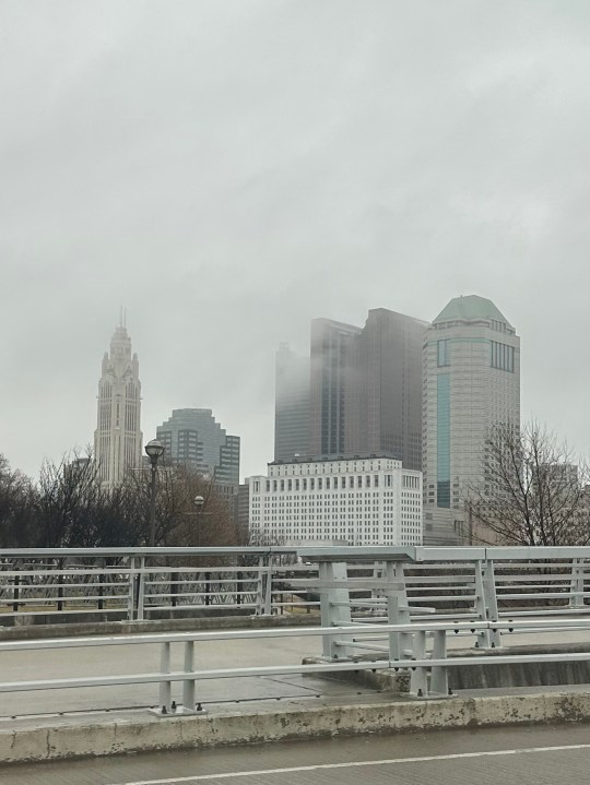 Evening drizzle, snow showers, windy, colder Sunday