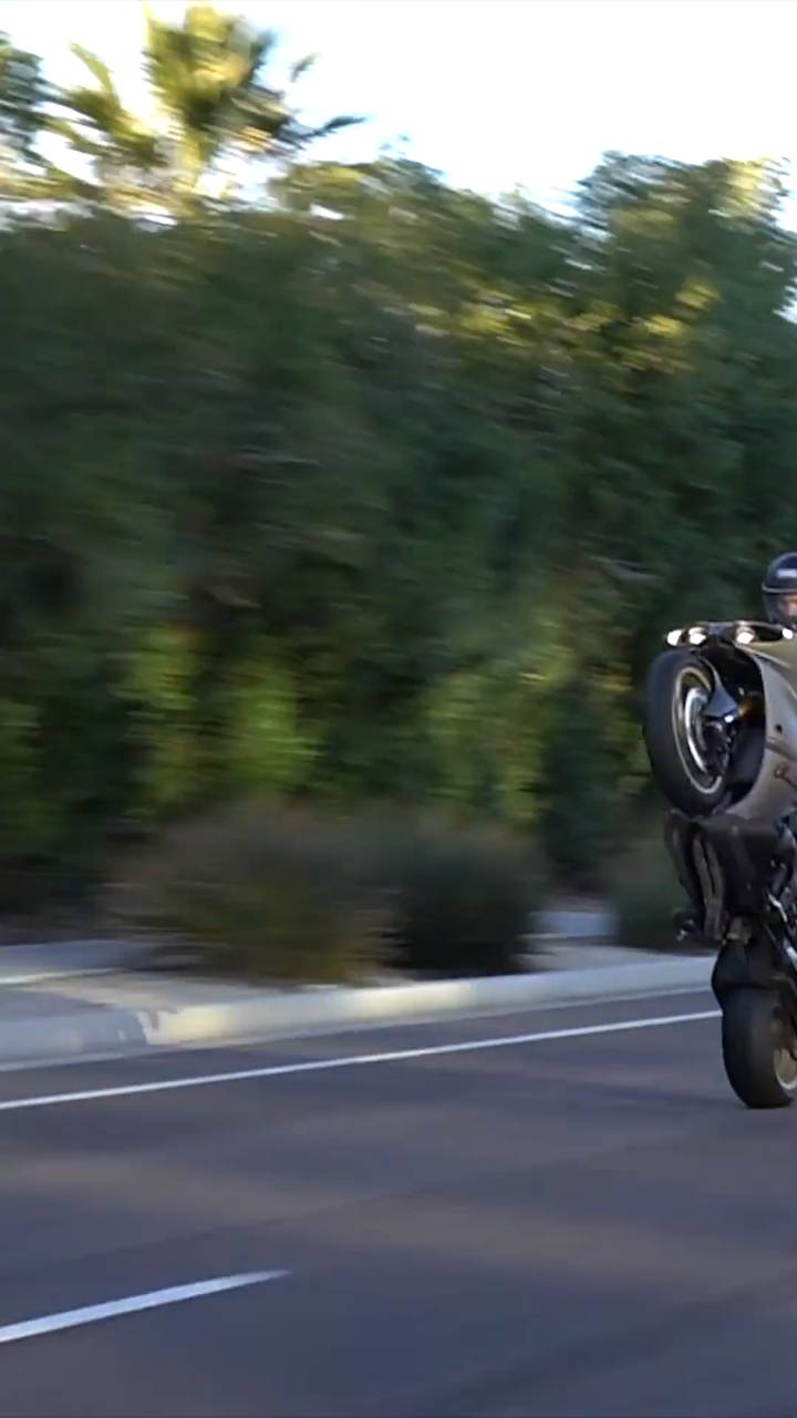 Japanese sport bike wheelie technique demonstration