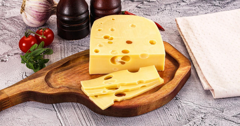 Why does Swiss cheese have holes? This question never had an answer ...