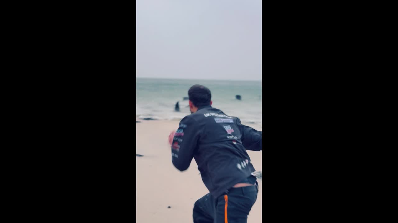 Storm Chasers hat flys off whilst checking coastal wind conditions in ...