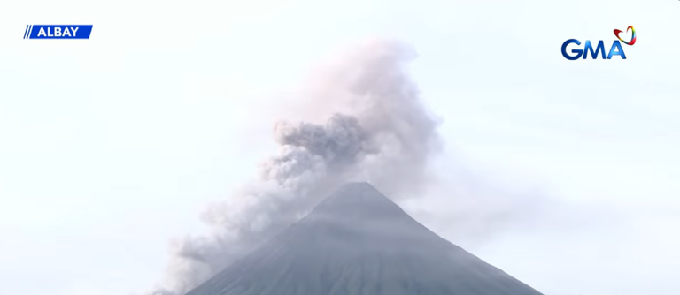 Despite ‘uson’, ashfall, Mayon Volcano continues to draw visitors