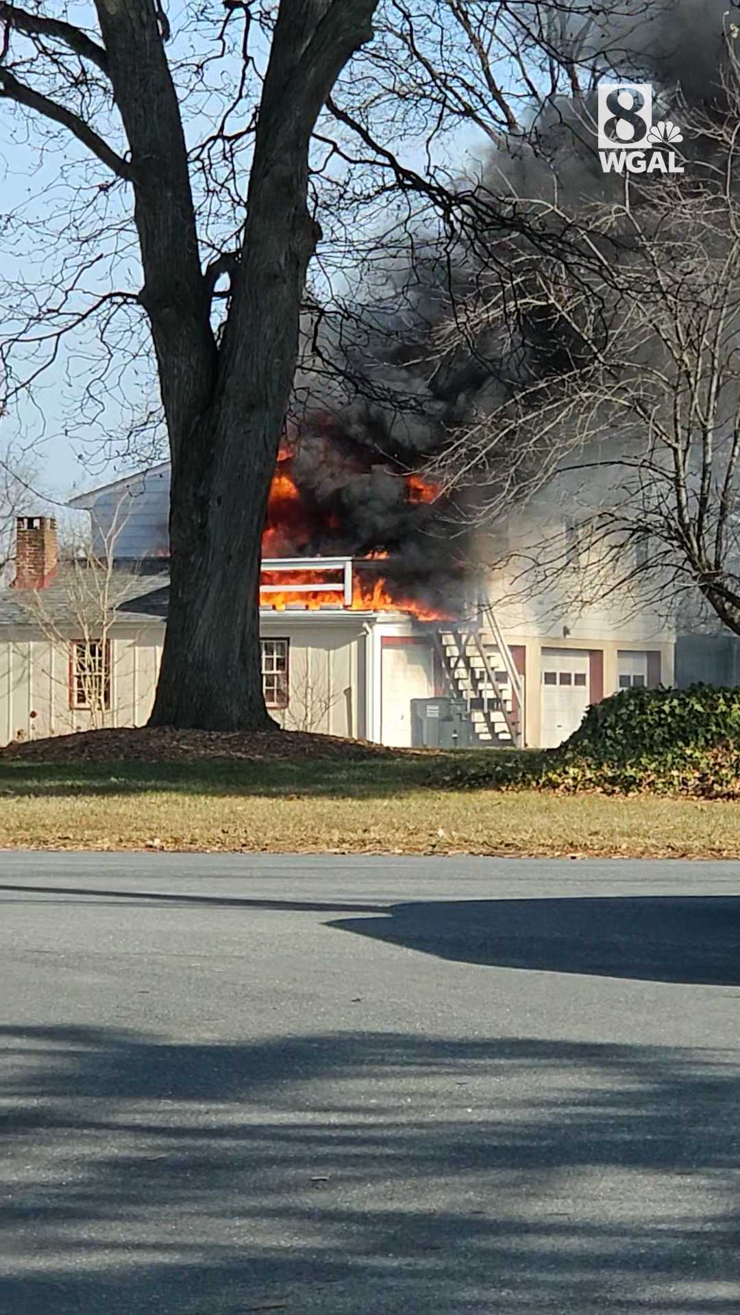 Coroner called to fire scene | Video shows smoke billowing from home