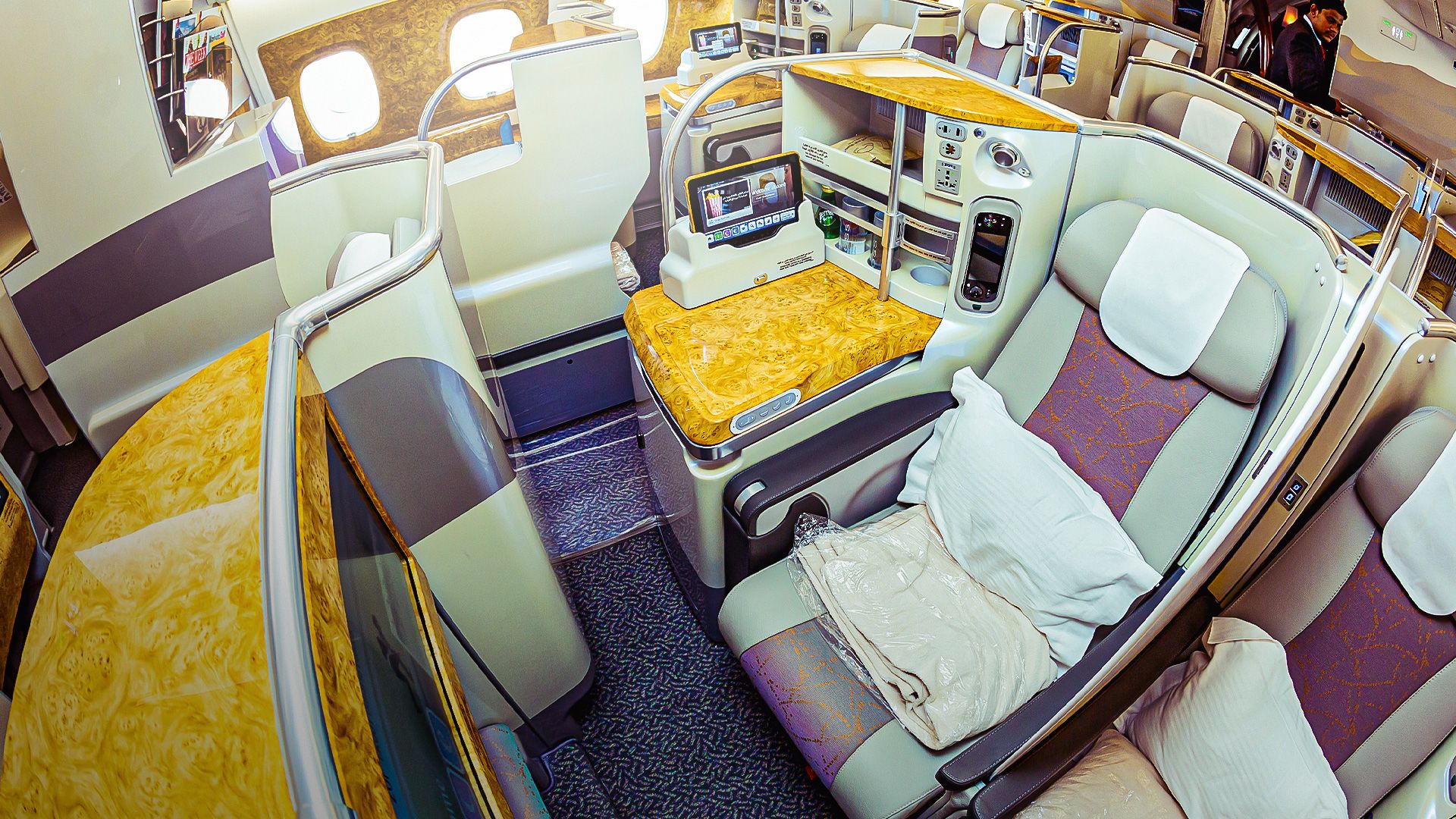 How much does it cost to upgrade to business class on Emirates?