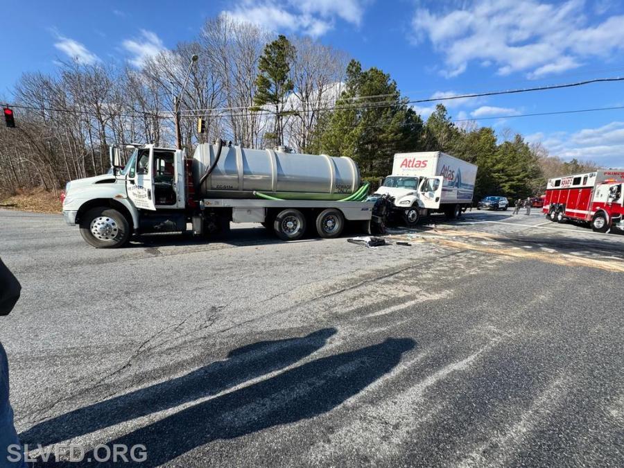 Driver flown to hospital after being crushed between 2 trucks during ...