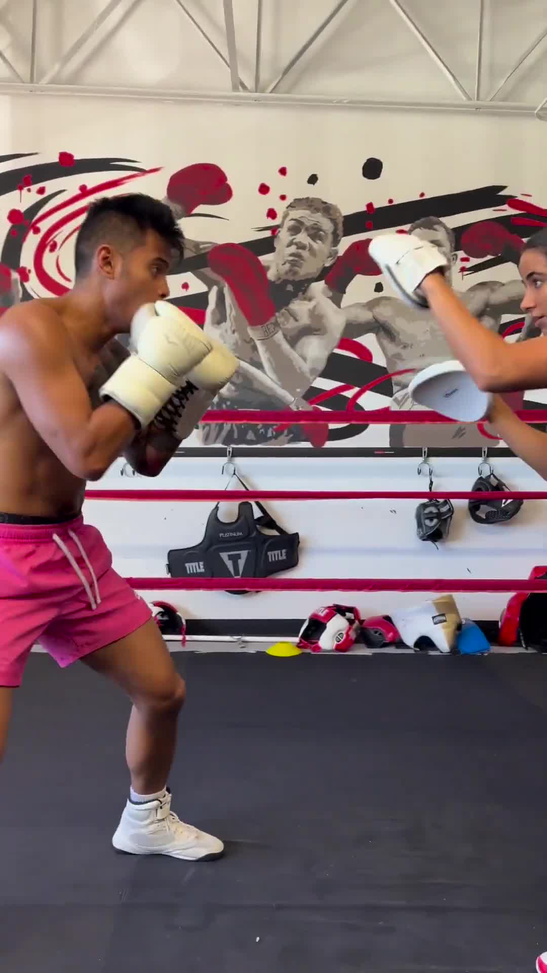 Crystal Thomas holding pads working with Filipino Flash⚡️Jeremy Paa