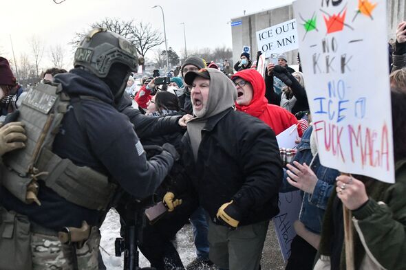 ICE agents shove women to the ground and Minnesota protestors cry ...