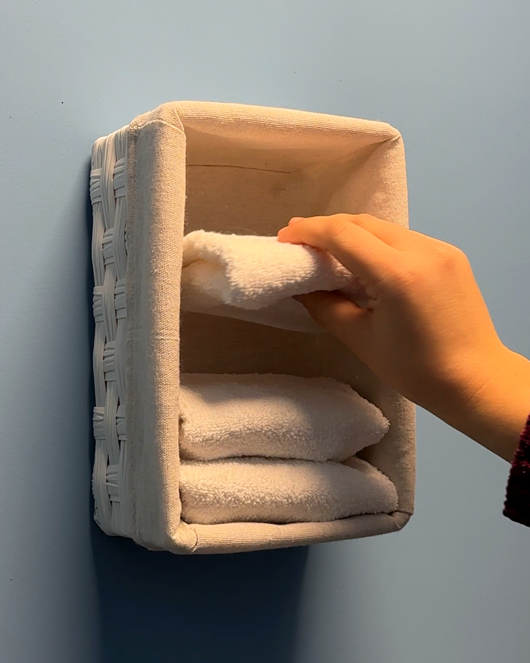 Fancy DIY bathroom towel organizer