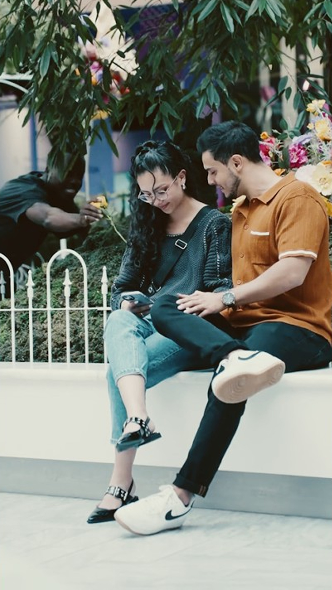 Sharing a flower with a random couple