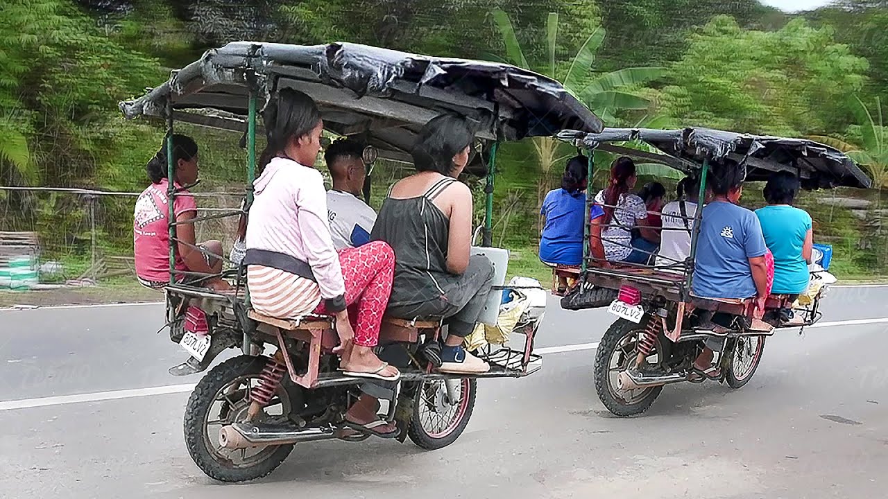 Riding a risky but super-cheap hand-built multi-seater taxi