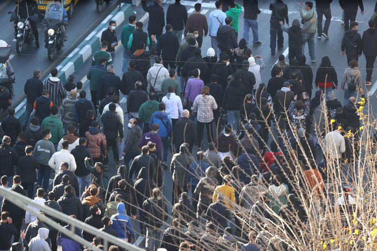 Iran protests latest: Tehran says it has arrested 100 'armed rioters'