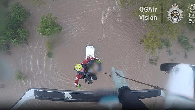 Aussies batten down the hatches as a potential cyclone looms off the ...