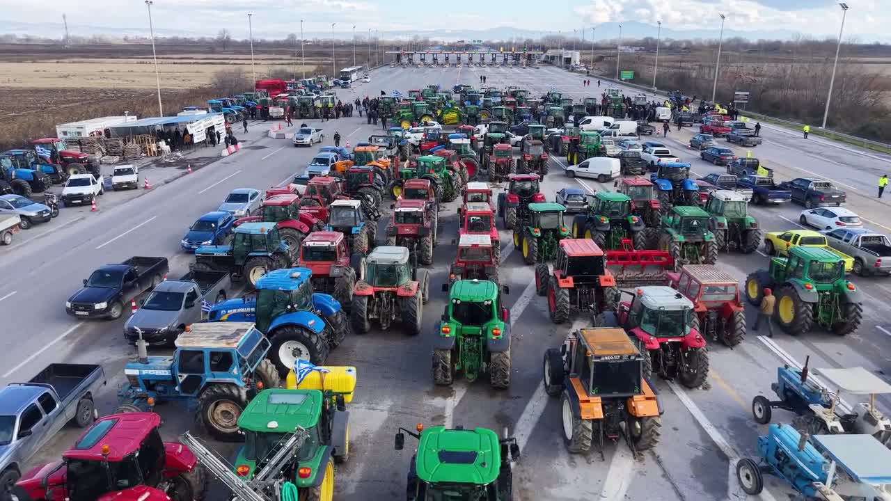 Greece farmers protest: Greek farmers block the highway road connecting ...