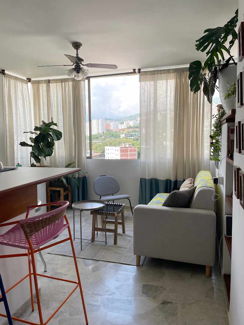 This 430-square-foot studio uses color, plants, and custom details to ...