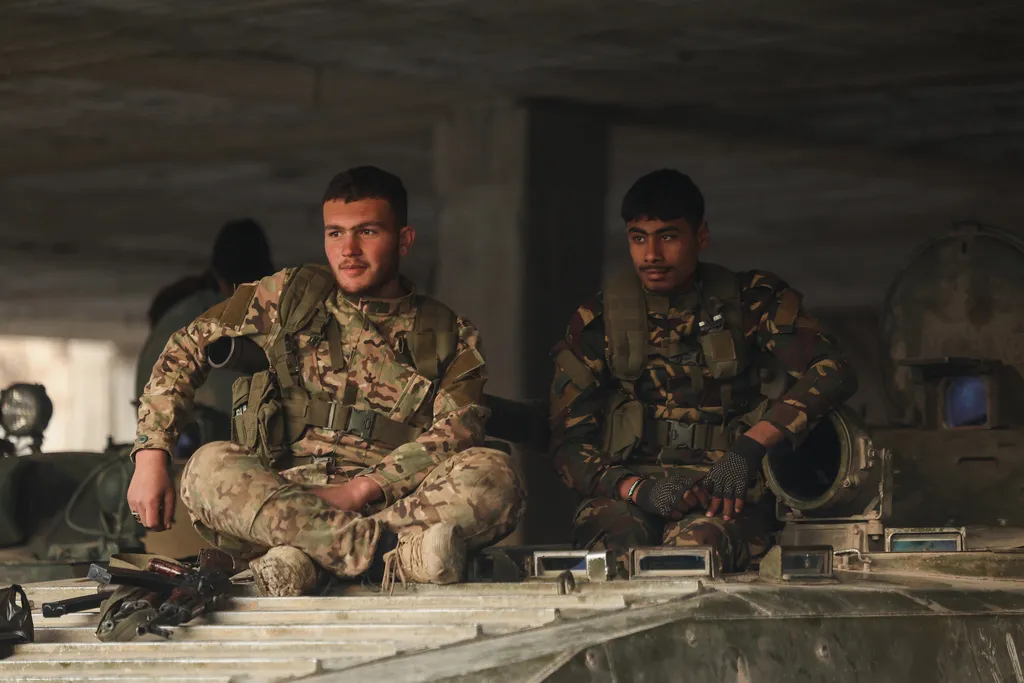 US struggles to rein in Syrian allies as Kurds and government come to ...