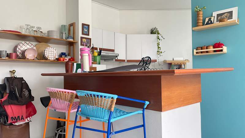 This 430-square-foot studio uses color, plants, and custom details to ...