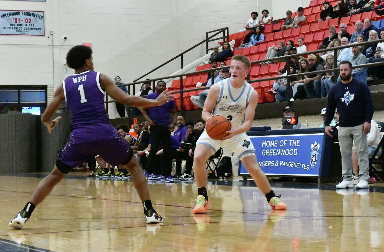 Rauman is the 'quiet leader' of Greenwood boys basketball