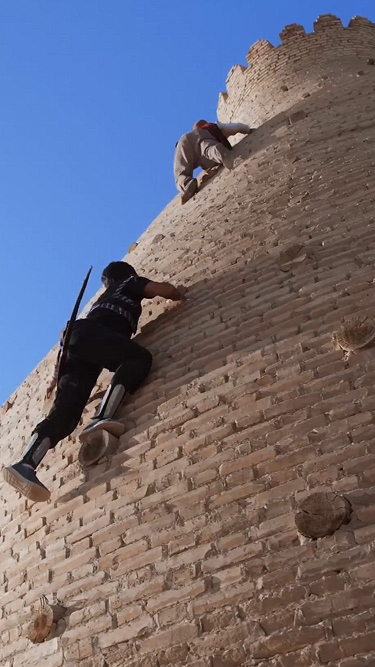 Climbing a castle wall