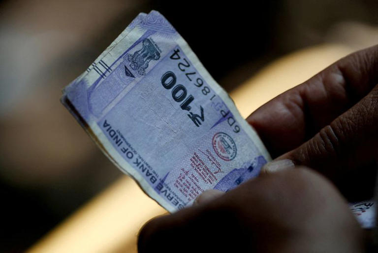 Rupee dips as NDF maturities, corporate hedging pinch