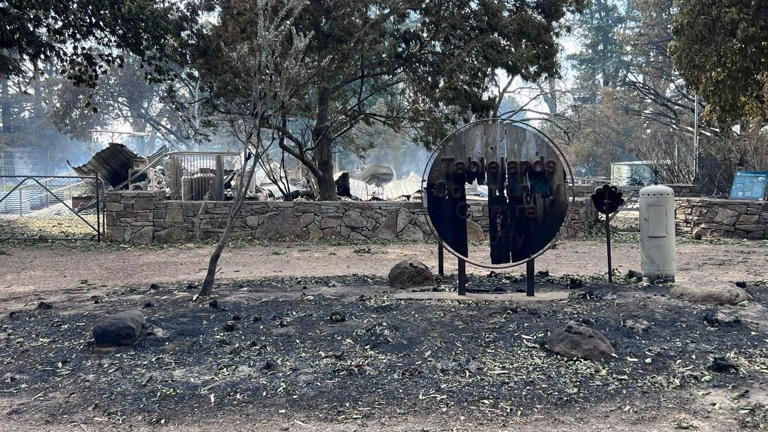 Three people missing as bushfire burns out of control