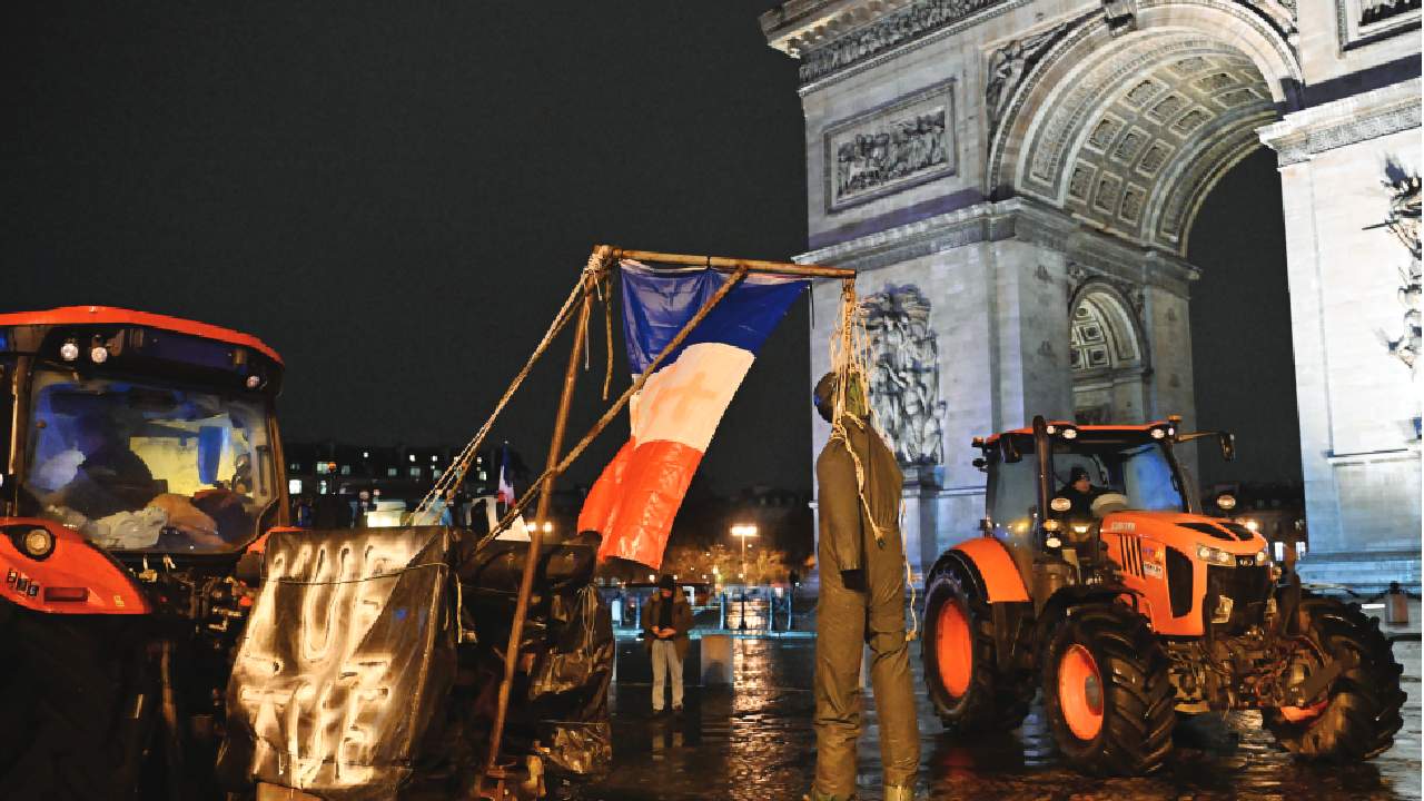 French farmers block Paris streets with tractors over trade deal
