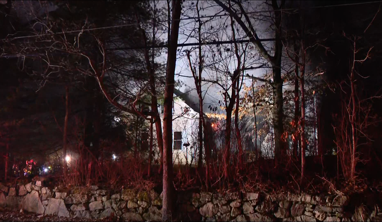 Crews battle 4-alarm fire at home in Mass. town
