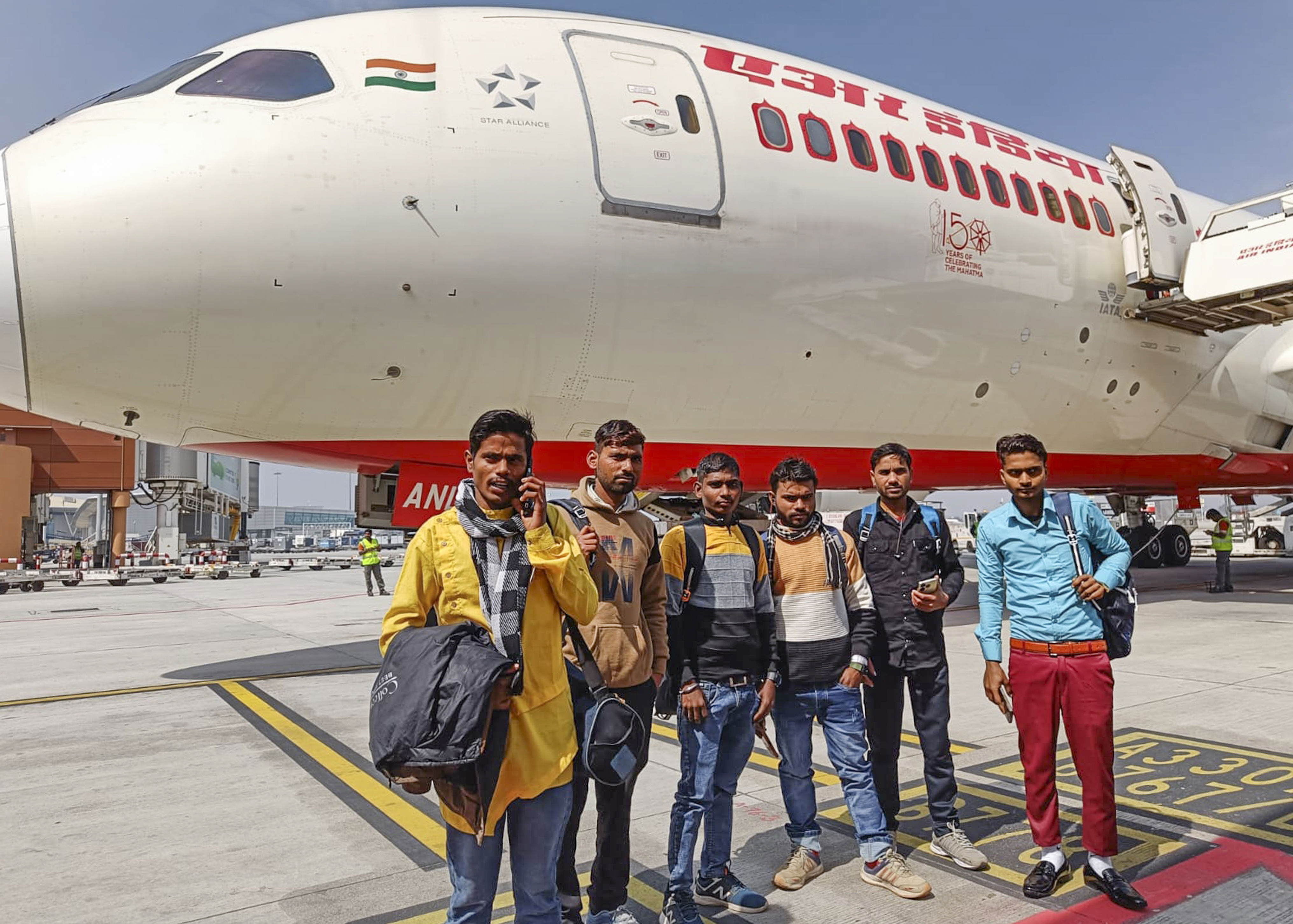 Skilled blue-collar workers fly to work sites as infrastructure boom ...