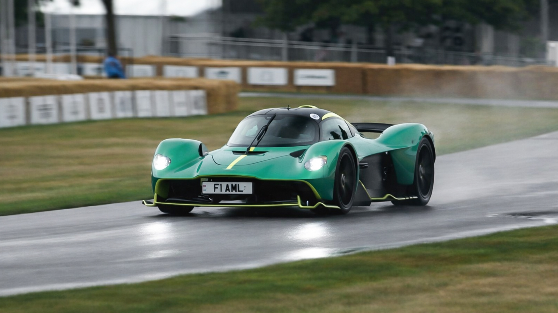 Green Aston Martin Valkyrie tackles slippery circuit