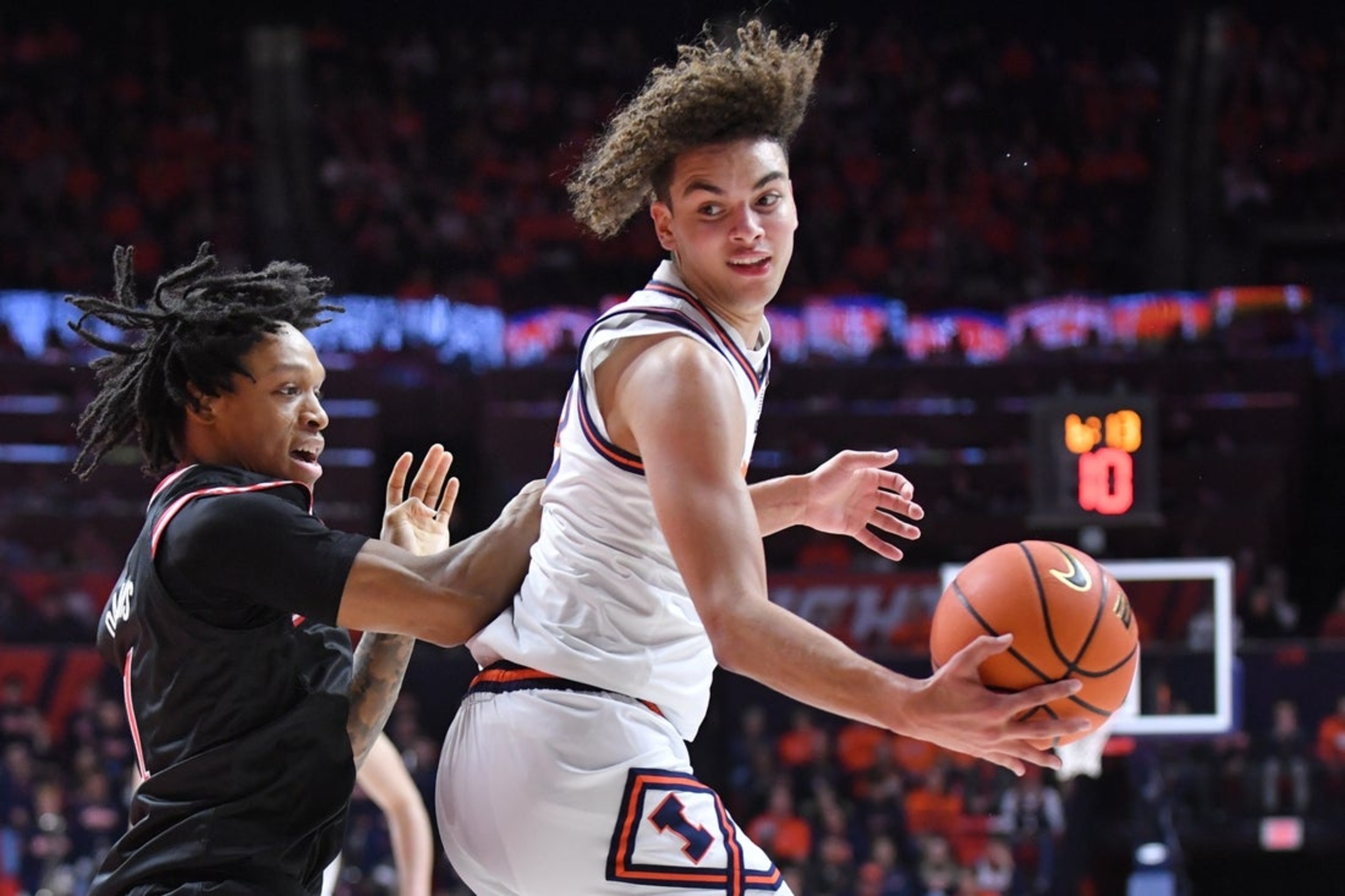 Remarkable run to finish 1st half helps No. 16 Illinois bury Rutgers