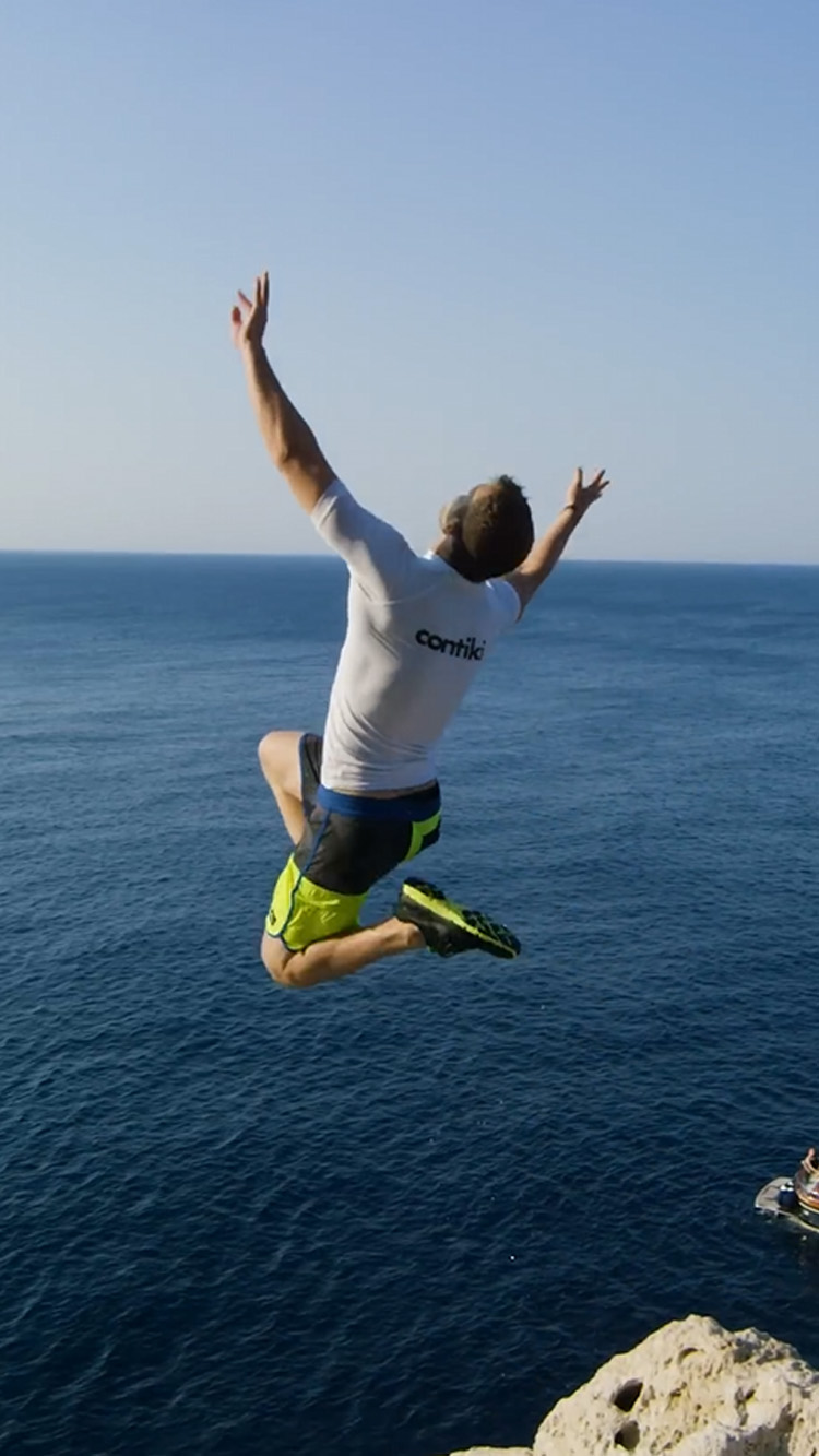 Jumping off coastal cliffs in Spain