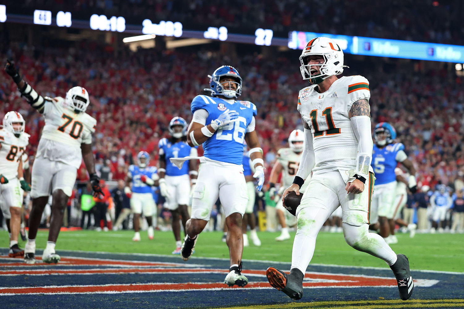 Miami outlasts Ole Miss 31-27 to advance to College Football Playoff ...