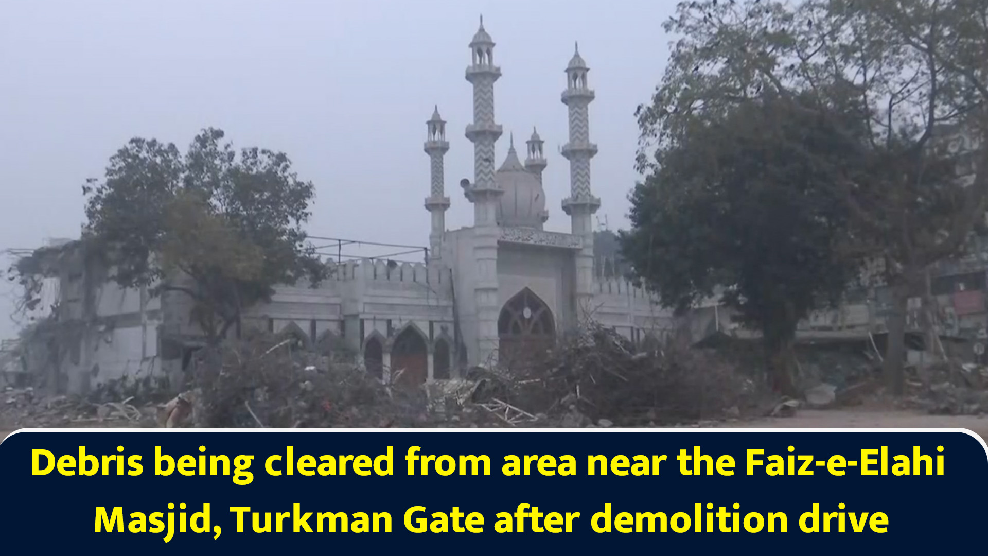 Debris being cleared from area near the Faiz-e-Elahi Masjid, Turkman ...