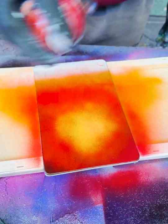 I asked a street artist to spray paint an Amazon tablet