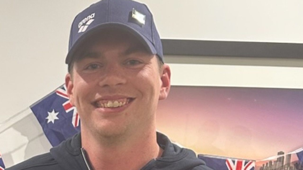 Swim coach arrested poolside, court told