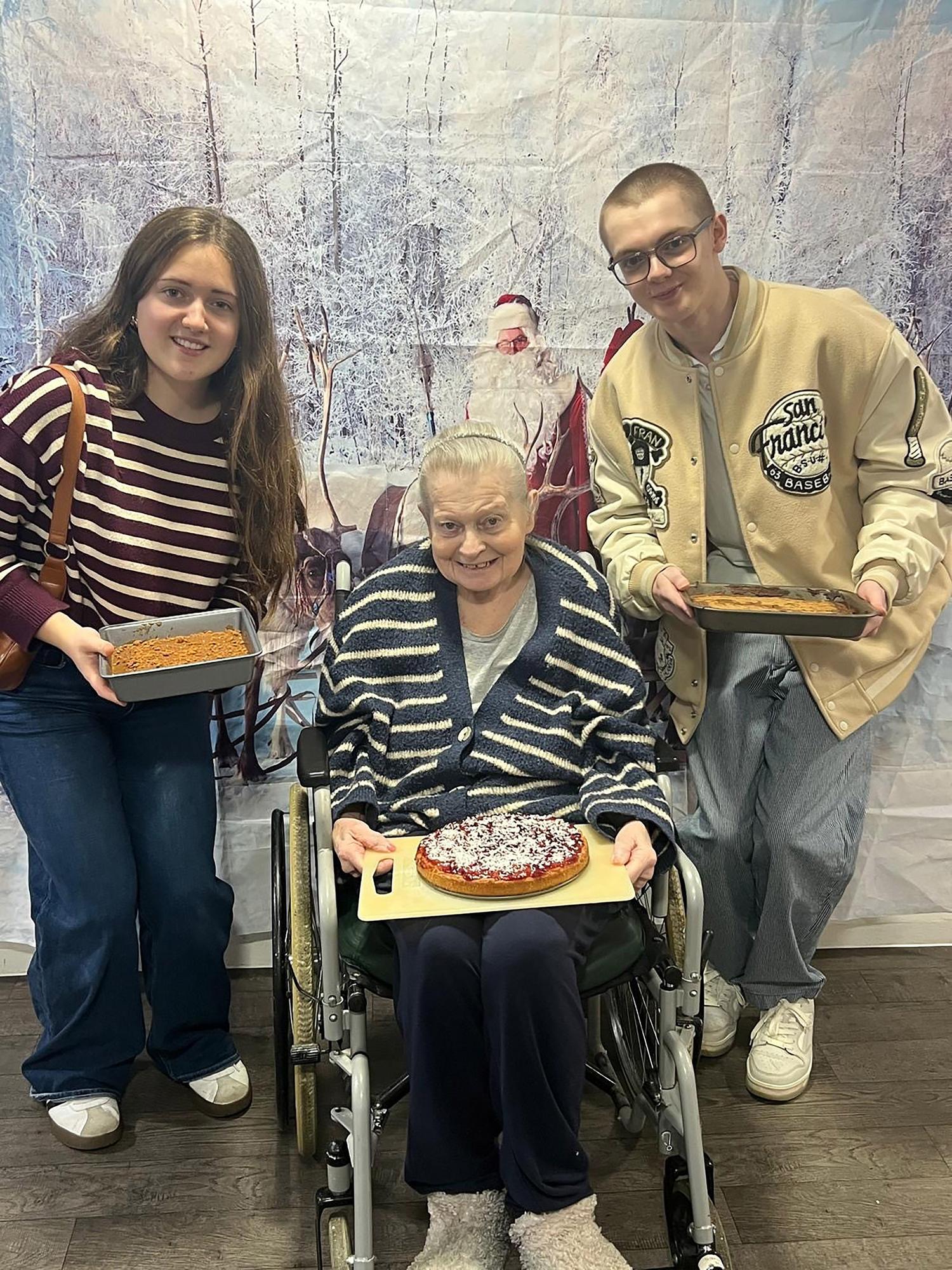 Young bakers bring smiles to residents at Pytchley Court Care Home