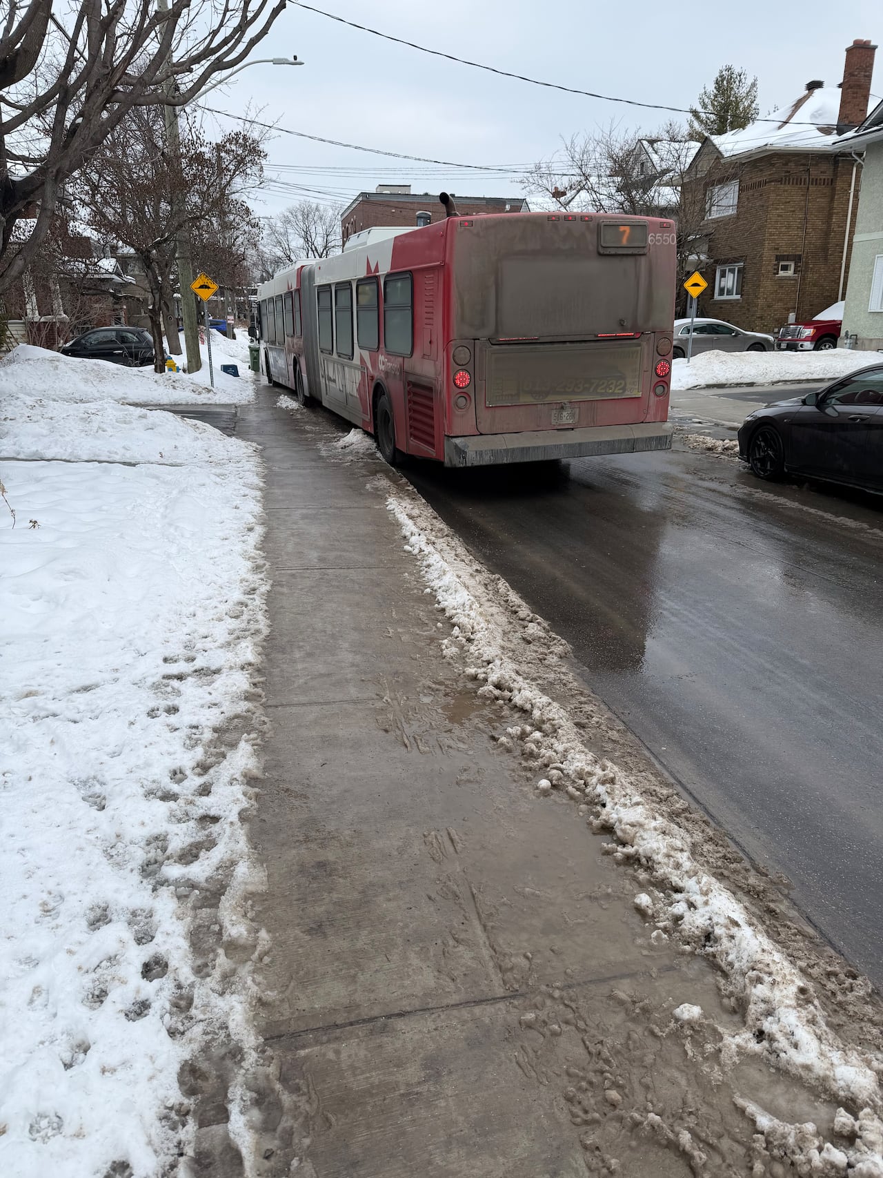 Snow buildup on this Ottawa street is forcing buses up on the curb ...
