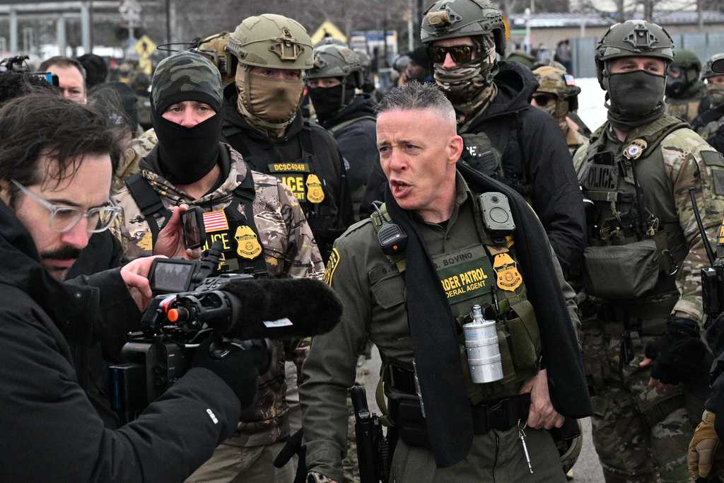 Anger and outrage spill onto Minneapolis streets after ICE officer's ...