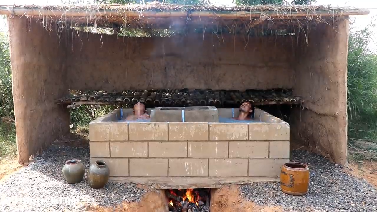 Building a warm water pool using primitive techniques
