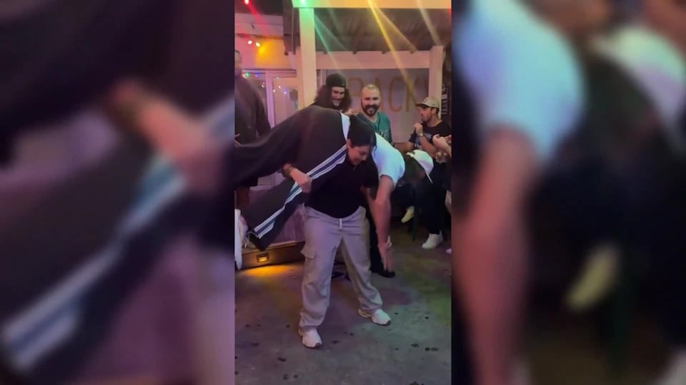 Watch: NFL fan goes viral after squatting Trevor Lawrence at bar