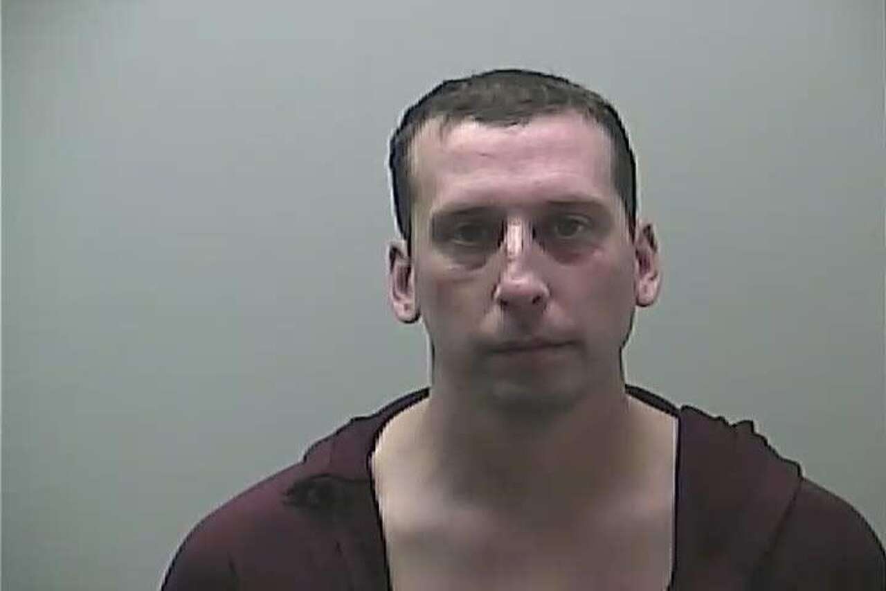 Man charged in attempted strangling of wife