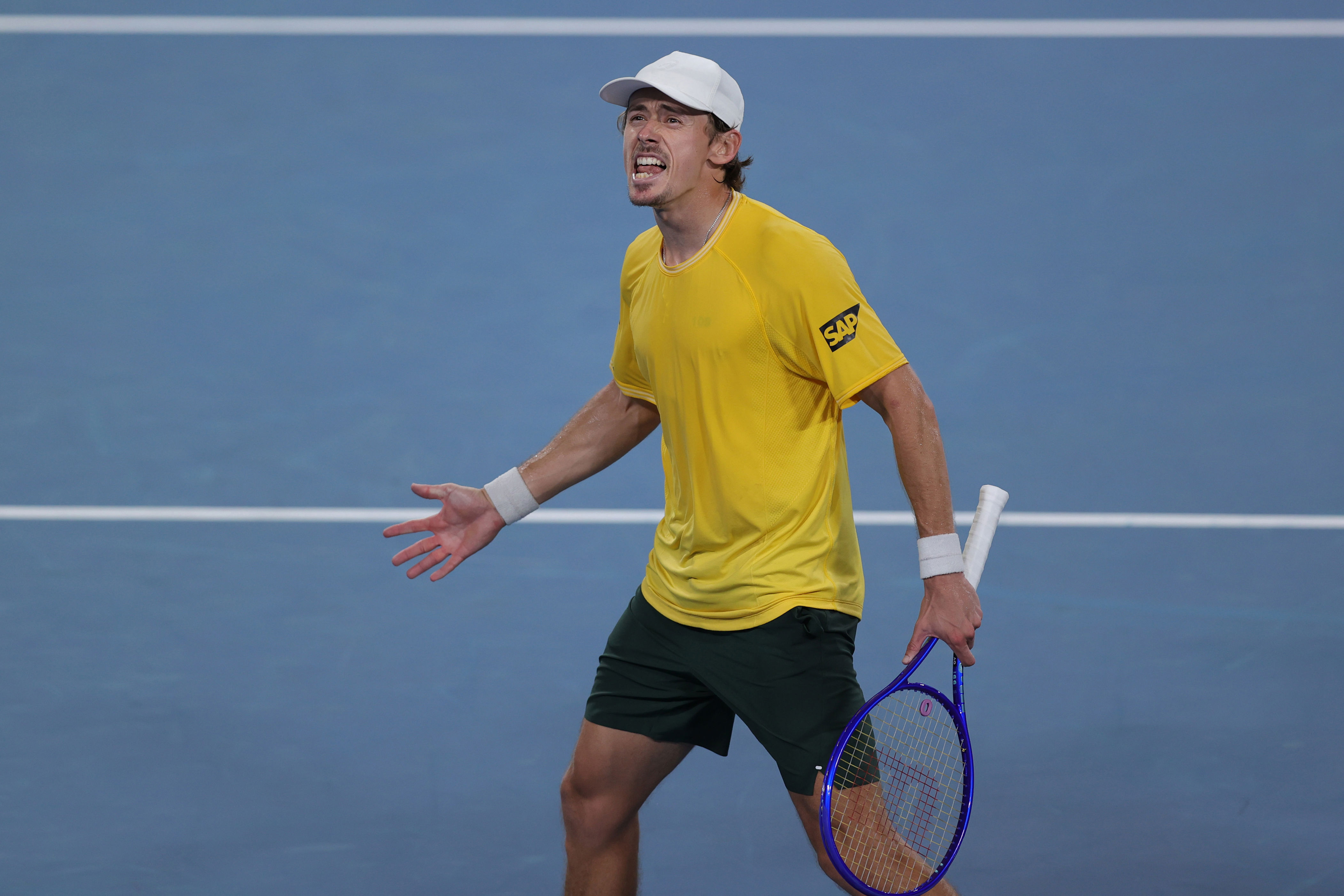 De Minaur defies 'dark thoughts' to send grand slam warning