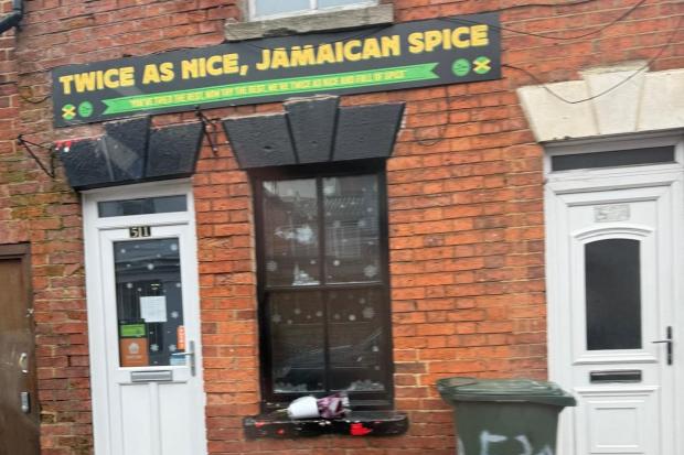 Flowers left outside takeaway following death of 'beloved' owner