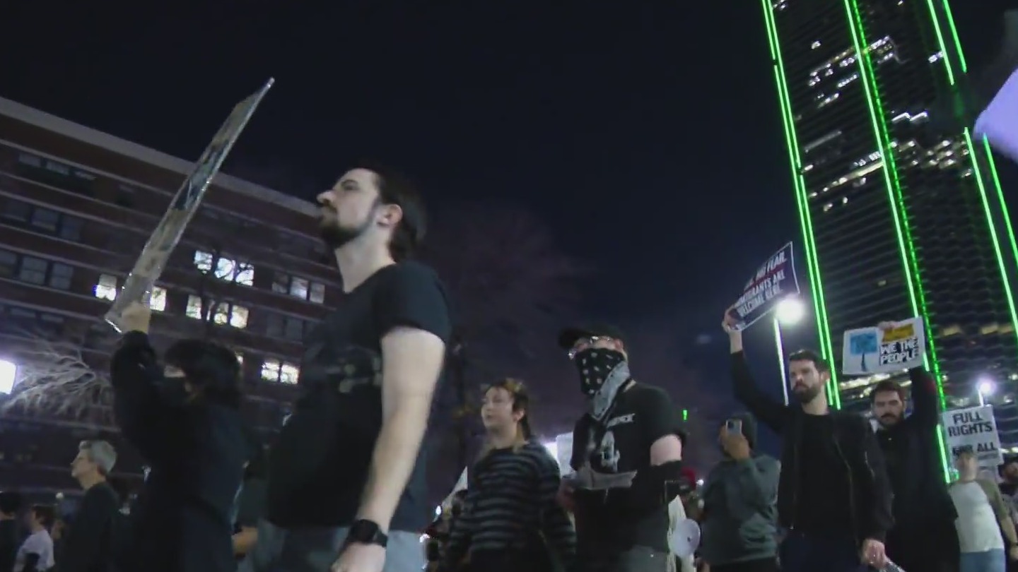 Protesters march in downtown Dallas in response to Minnesota ICE shooting