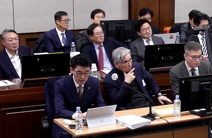 Ex-President Yoon attends insurrection trial