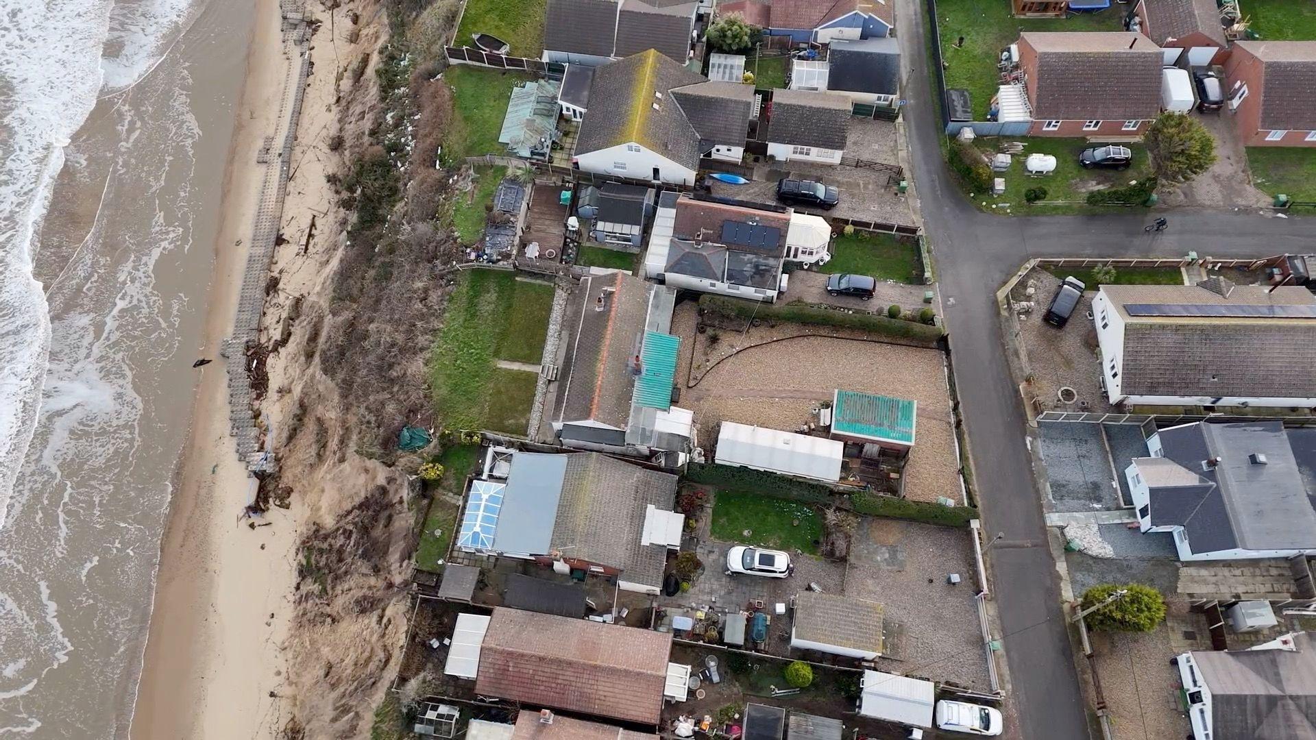Clifftop demolition continues as residents move out