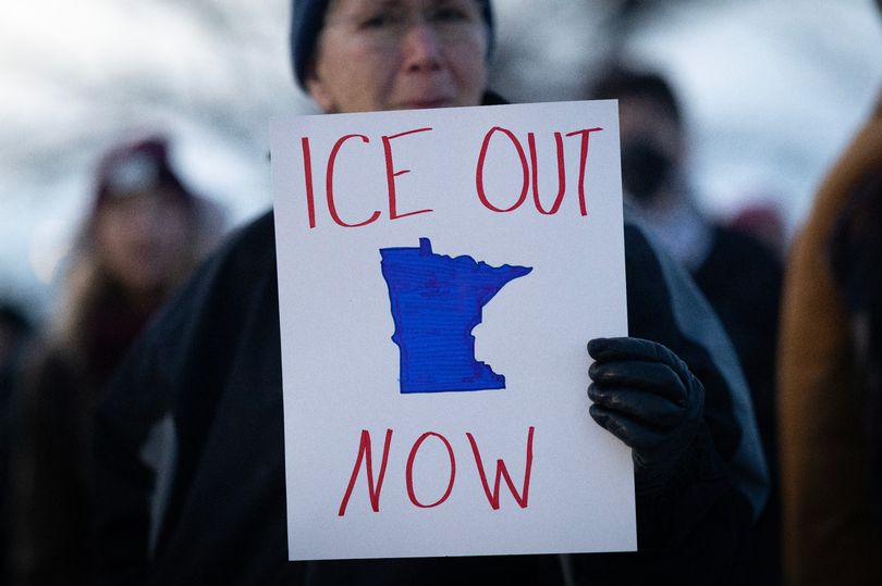 ICE agent pulls out gun in women's face amid ticking time bomb for ...