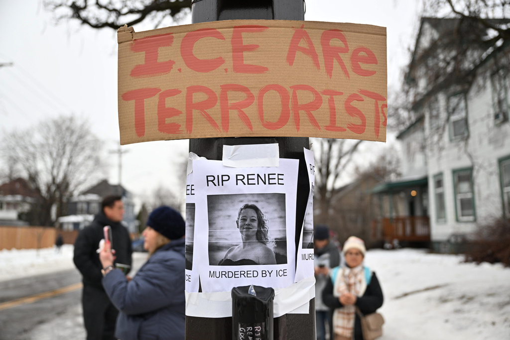 Protesters vent outrage over the immigration enforcement shootings in ...