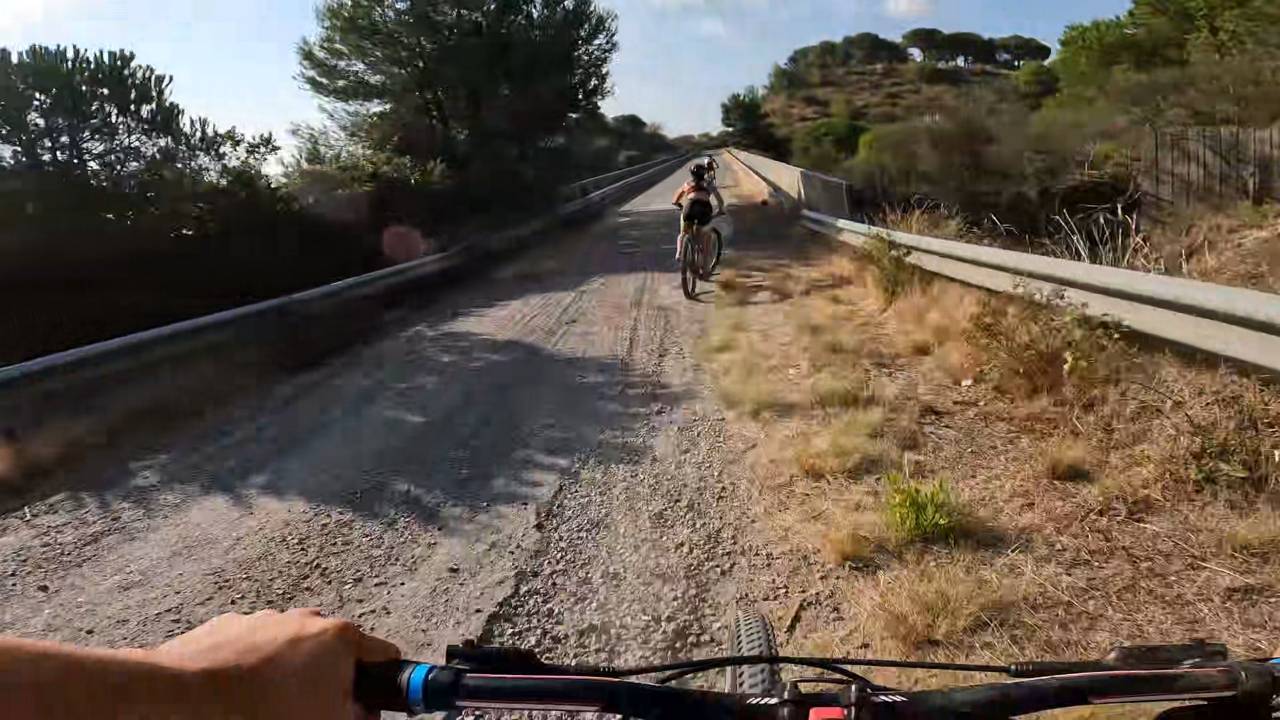 Cyclist crashes after fast overtake on rough road in Pineda de Mar ...