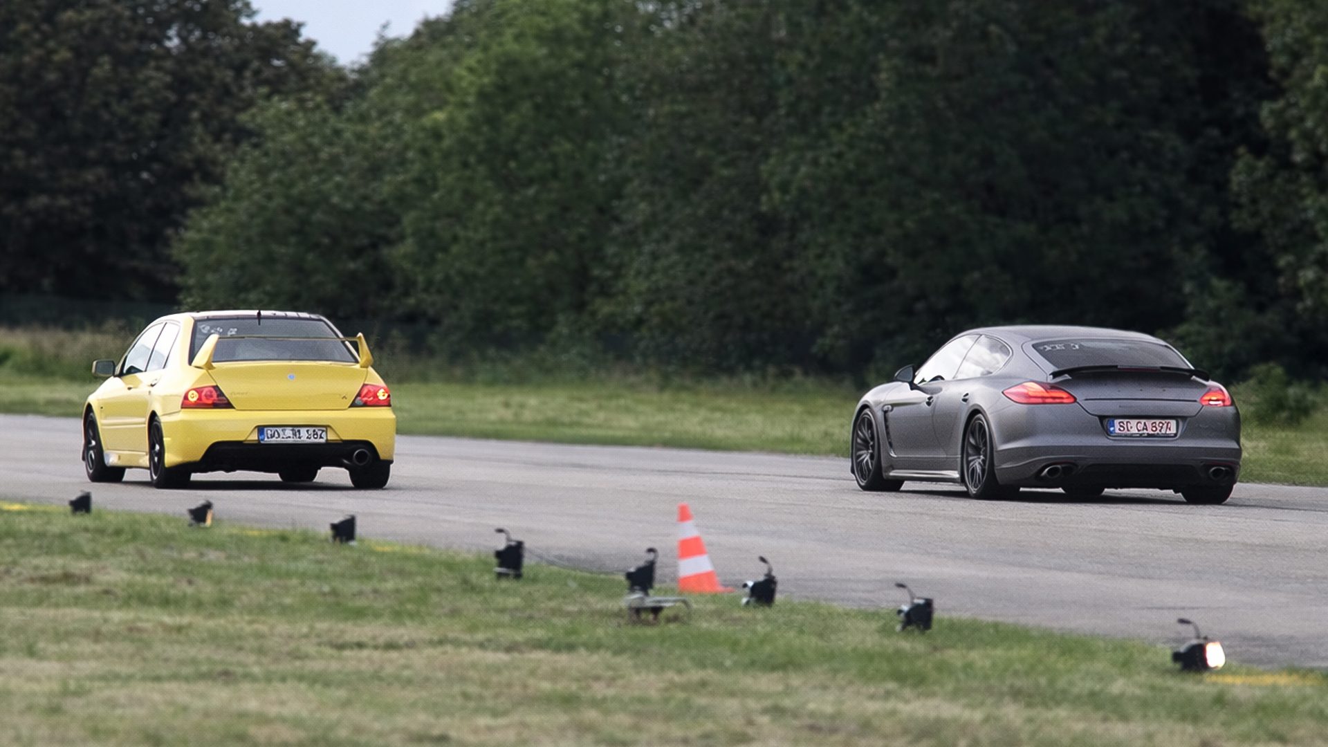 Turbocharged power battle between Porsche and Evo