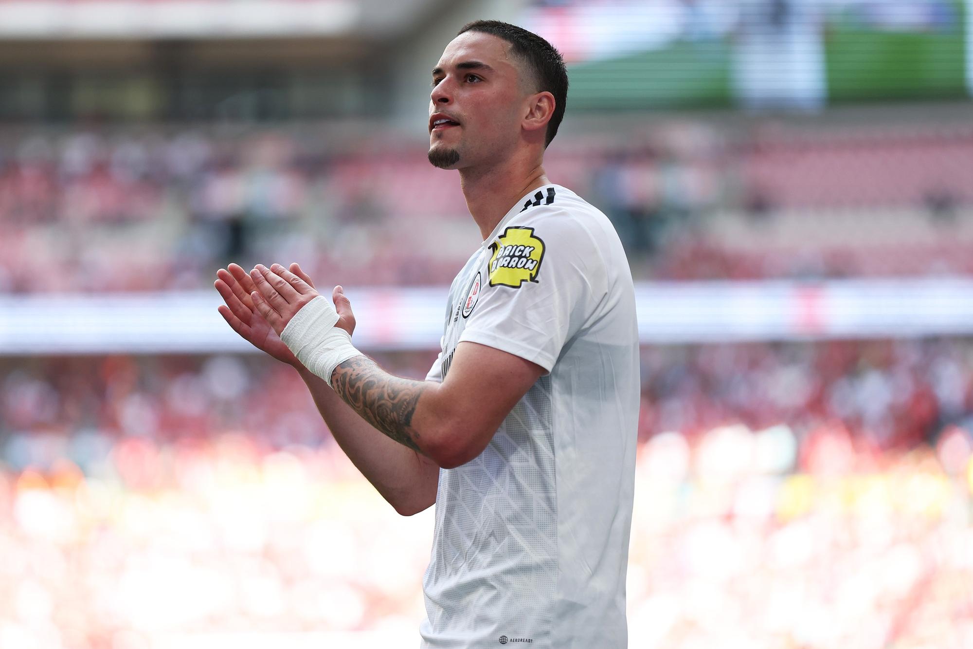 Done deal: Peterborough United and former Bolton forward's return to ...